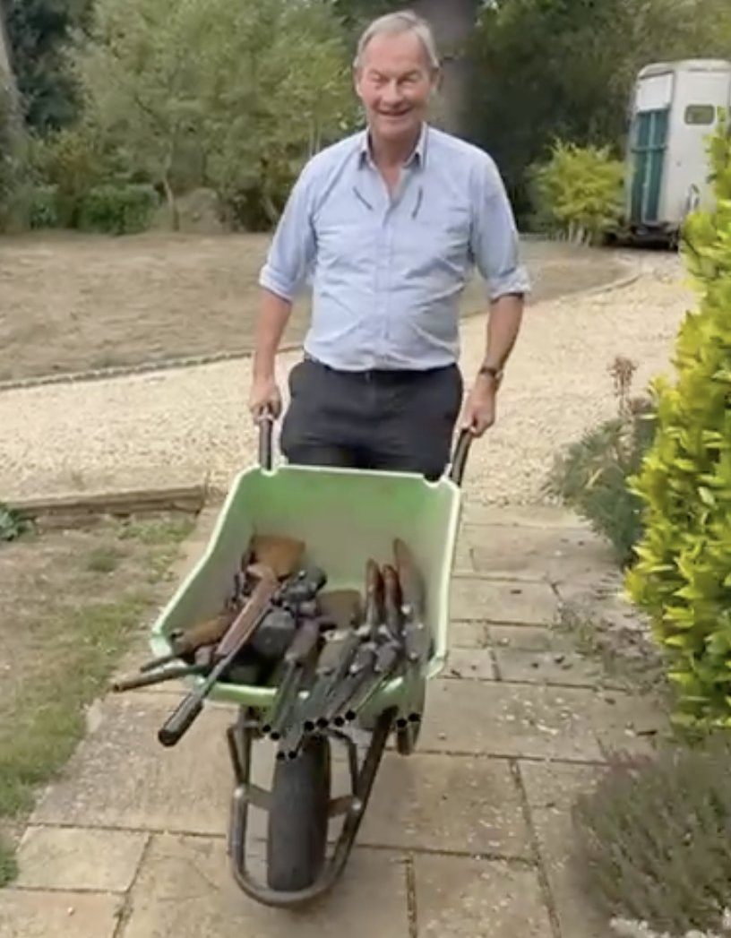 Ex-Reform MP Rupert Lowe posts bizarre photo with wheelbarrow-load of ...